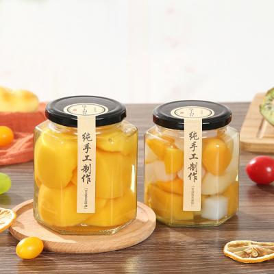 Cina Barattoli di vetro a forma di esagonali di stoccaggio del coperchio a vite, inceppamento Honey Jars di vetro della spezia in vendita