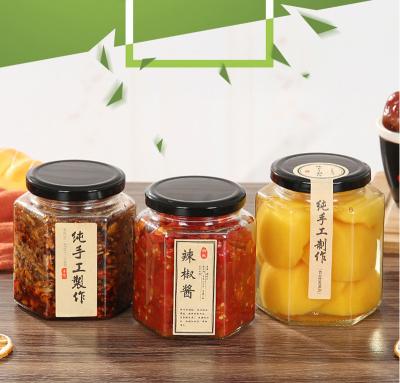 Cina Barattoli di vetro a forma di esagonali di stoccaggio del coperchio a vite, inceppamento Honey Jars di vetro della spezia in vendita