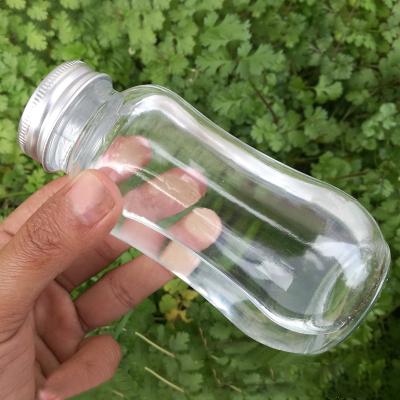 Cina Capacità vuota di Juice Bottles 200ml del vetro trasparente del commestibile con la copertura di alluminio in vendita