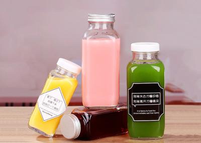 Cina Imballaggio quadrato di Juice Bottles Strong Sealing Coffee di vetro del cappuccio di plastica in vendita