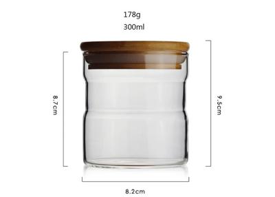 Cina Stoccaggio della cucina del barattolo della bottiglia di vetro di forma di esagono con la certificazione di bambù dello SGS del coperchio in vendita