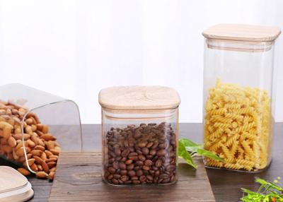 Cina Il vetro vuoto del borosilicato stona i grandi contenitori di stoccaggio di vetro dell'alimento con i coperchi di bambù ermetici 1000ml in vendita