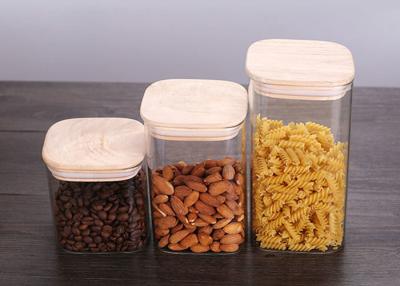 Cina Il vetro vuoto del borosilicato stona i grandi contenitori di stoccaggio di vetro dell'alimento con i coperchi di bambù ermetici 1000ml in vendita