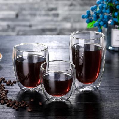 Cina Tazza di vetro dell'acqua del doppio di 250ml a forma di uovo 350ml 450ml in vendita