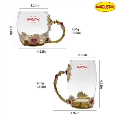 Cina 330ml 350ml ha decorato la tazza di vetro BPA dello smalto libera con il cucchiaio in vendita