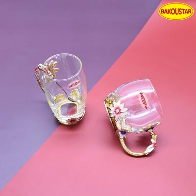 Cina 330ml 350ml ha decorato la tazza di vetro BPA dello smalto libera con il cucchiaio in vendita