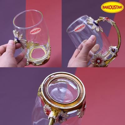 Cina 330ml 350ml ha decorato la tazza di vetro BPA dello smalto libera con il cucchiaio in vendita