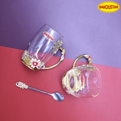 Cina 330ml 350ml ha decorato la tazza di vetro BPA dello smalto libera con il cucchiaio in vendita