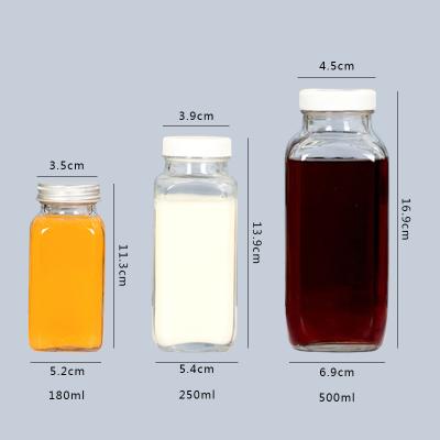 中国 正方形の明確なガラス飲料はプラスチックねじふたが付いている500ml注文のラベルをびん詰めにする 販売のため