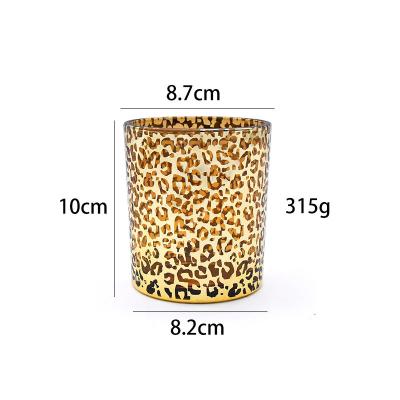 China O GV geou o castiçal de vidro da cópia nórdica do leopardo à venda
