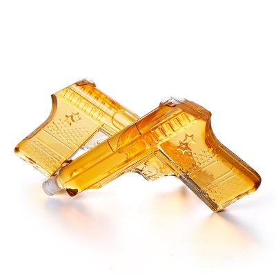 Cina Chiara lunghezza della bottiglia di whiskey di vetro di forma della pistola della mano 500ml 26cm in vendita