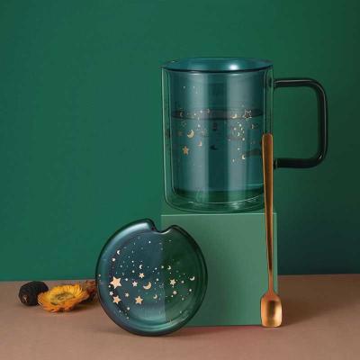 Cina Il borosilicato di verde della stella ha personalizzato il doppio strato della tazza di vetro in vendita