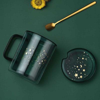 Cina Il borosilicato di verde della stella ha personalizzato il doppio strato della tazza di vetro in vendita