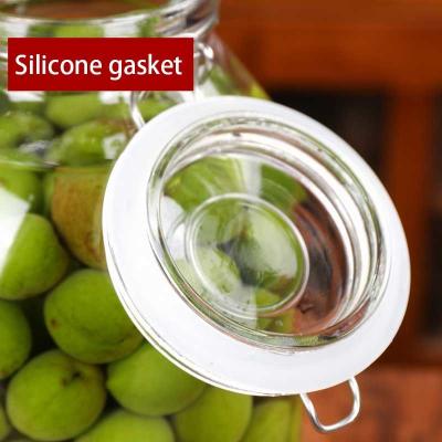 Cina barattoli di vetro di stoccaggio del sottaceto della famiglia 1000ml con il coperchio del catenaccio in vendita