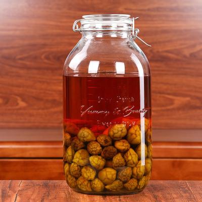 Cina barattoli di vetro di stoccaggio del sottaceto della famiglia 1000ml con il coperchio del catenaccio in vendita