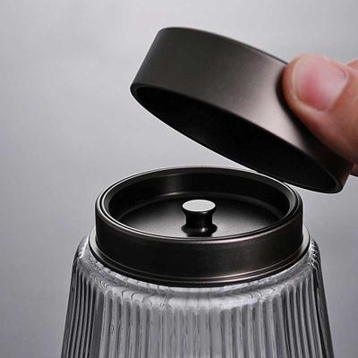 Cina 300ml ha sentito i barattoli di stoccaggio di vetro del tè con la doppia copertura di sigillatura in vendita