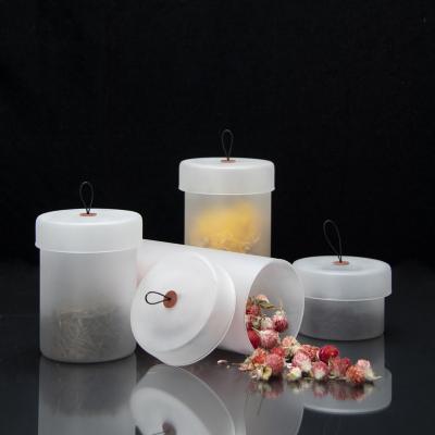 Cina l'alto barattolo del tè del vetro borosilicato di 300ml 700ml 900ml 1100ml ha glassato il barattolo di vetro di stoccaggio del coperchio in vendita