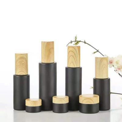 China el vidrio cosmético hermético 6ml embotella la botella de perfume de la bola de rodillo con la tapa de bambú en venta