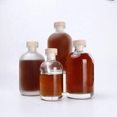 Cina sughero di legno di Gin Wine Glass Bottles With della radura del gelo di 100ml 500ml in vendita