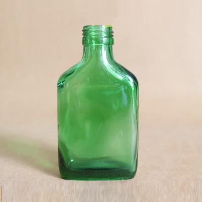 中国 100ml 200mlの緑の空のガラスねじふたのシーリングをワイン・ボトル 販売のため