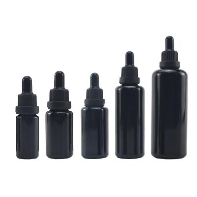 Cina bottiglia di vetro nera cosmetica del contagoccia di 10ml 30ml con il coperchio a vite in vendita