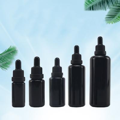 Cina bottiglia di vetro nera cosmetica del contagoccia di 10ml 30ml con il coperchio a vite in vendita
