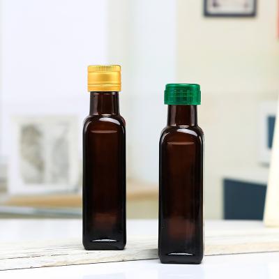 Cina Copertura di Olive Oil Bottle With Plastic di vetro del quadrato 100ml Brown in vendita