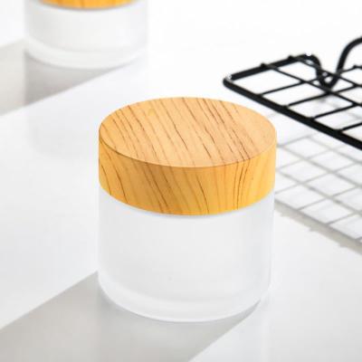 China Frasco de vidro de vidro cosmético geado do creme das garrafas 15g 30g de Skincare com tampa de bambu à venda