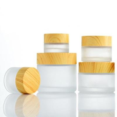 China Frasco de vidro de vidro cosmético geado do creme das garrafas 15g 30g de Skincare com tampa de bambu à venda