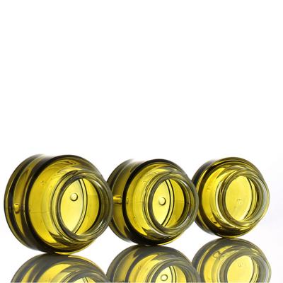 Cina il vetro del cosmetico della spalla di inclinazione di 30g 50g stona il barattolo di timbratura caldo della crema dell'occhio di vetro in vendita