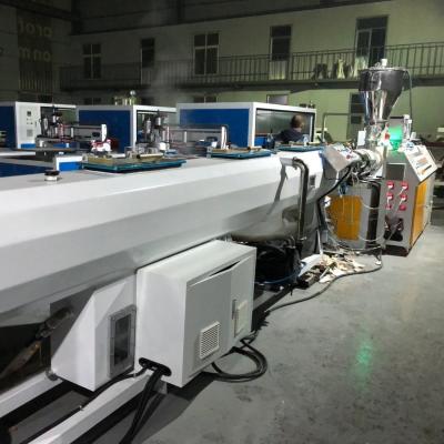 Chine Système d'interconnexion complète SJ65/33 Ligne de production de tuyaux en PVC avec matériaux à vendre