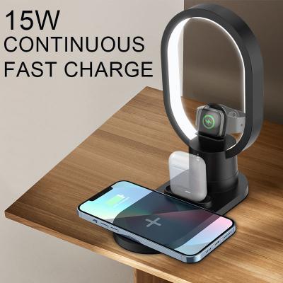China Sensor inteligente carregador sem fio multifuncional 4 em 1 desktop para Airpods à venda