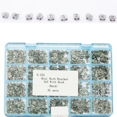 China Orthodontic Passive Self Ligating Brackets Crystal Sapphire Braces 345 Hook for sale