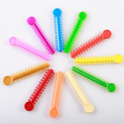 Cina Casella di legatura ortodontica a 39 colori con fonte di alimentazione manuale e design trasparente in vendita