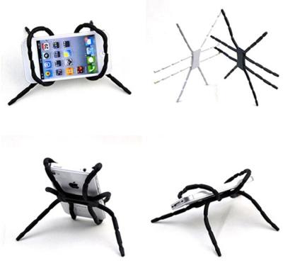 China New design cheap novelty magical spider shaped PVC mobile phone holder stand for sale