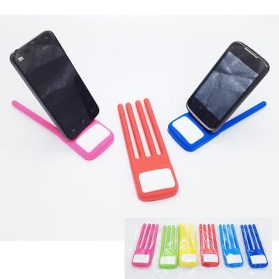 China FDA SGS Fold Finger Shape Silicone Phone Holder Novelty Silicone Mobile phone Holder stand for sale