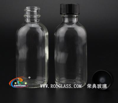China 2oz clear boston round glass bottle with cone lined black phenolic caps for sale