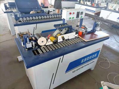China 220v Automatic Edge Banding Machine End Cutting Buffing Pvc Edging Machine for sale