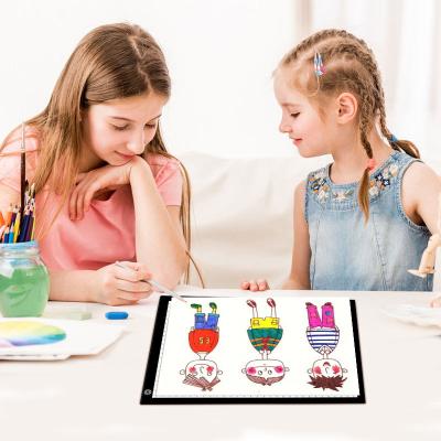 China Digital Graphic Tablet A4 LED Artist Thin Art Stencil Drawing Board Light Box Tracing Writing Portable Drawing Board for Kids for sale