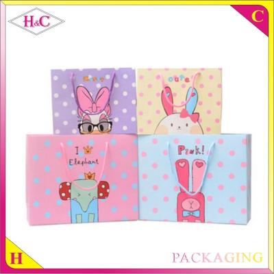 China Cute elfin hand length handle paperboard cartoon gift bag for sale