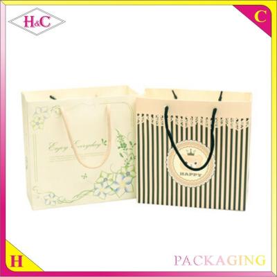 China Cute bear hand length handle paperboard cartoon gift bag for sale