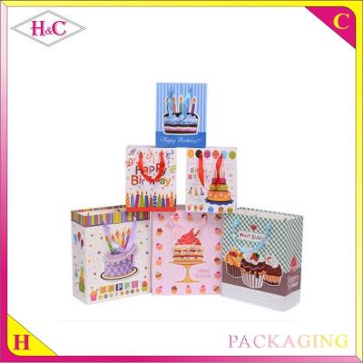 China Wholesale hand length handle paper gift bag for sale