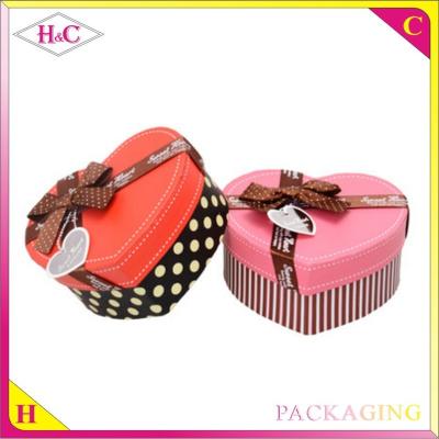 China Hot stamping handmade luxury paper heart-shaped packaging box with ribbon for sale