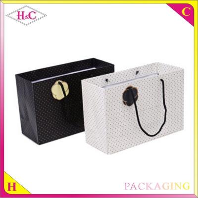 China Fashion hand length handle paperboard gift shopping bags for sale