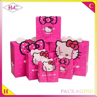 China Wholesale cartoon KT cat hand length handle paperboard gift packaging bag for sale