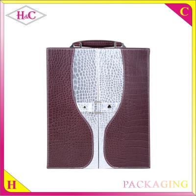 China Luxury Pu leather vino packaging box with handle for sale