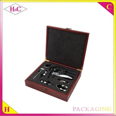 China Luxury red wood corkscrew packaging box mdf wine opener box for sale