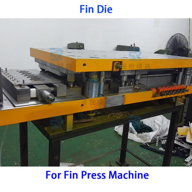 Fin Line machine operational view with aluminum foil processing
