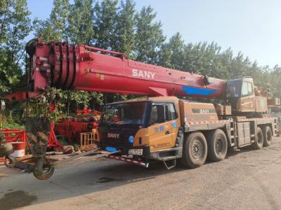 China Gele en rode 130T draagbare vrachtwagen kraan 17 jaar geschikt voor zware industrie Te koop