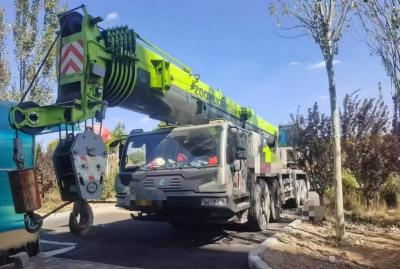 China Zeven Arms Groene Gebruikte Boom Truck Kran Professionele Met Hoge Efficiëntie Te koop